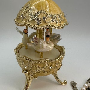 Swan Carousel Plays Swan Lake. Beautiful Scene of a Swan Taking off to ...