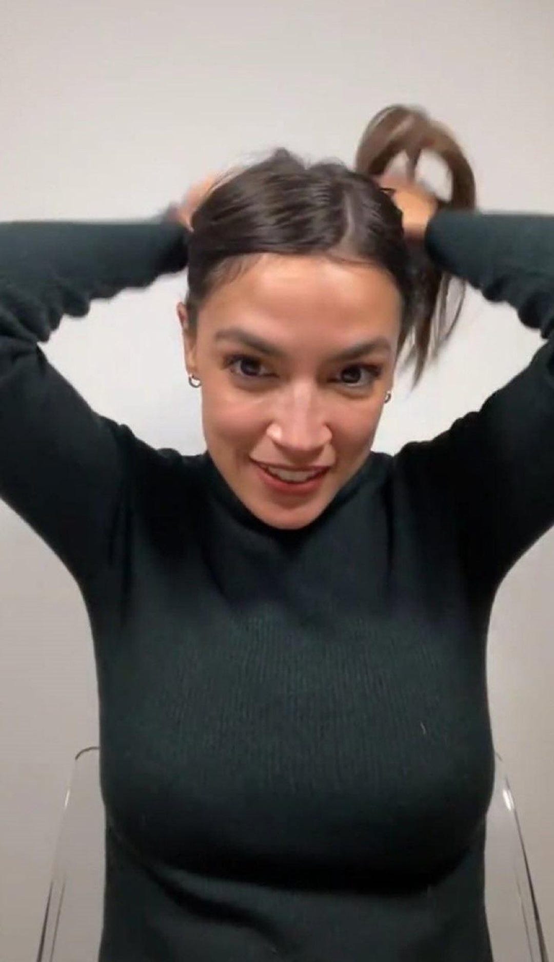 Alexandria Ocasio Cortez Aoc Tying Hair Glossy Poster Picture Photo ...