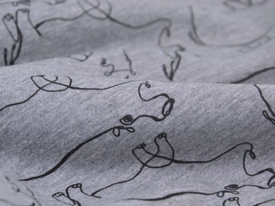 Sweatstoff in grau mit Nashörnern, aus Baumwolle - 150cm breit - Stoff ...