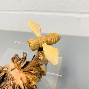 Parasite Bee Carving With Two Hand Carved Ornamental Bees Standing ...
