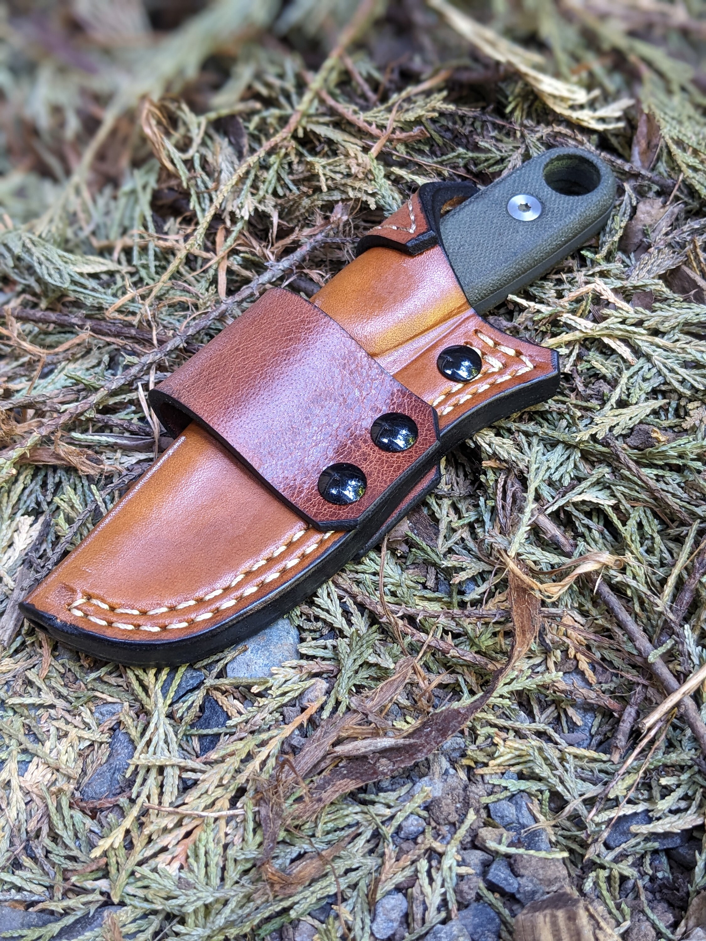 Esee Izula 2 leather scout sheath. Scout Ant design