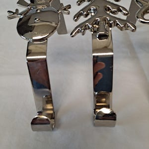 Lot 4 Metal Christmas STOCKING HOLDERS Clips Mantel Hanger Snowman Tree ...