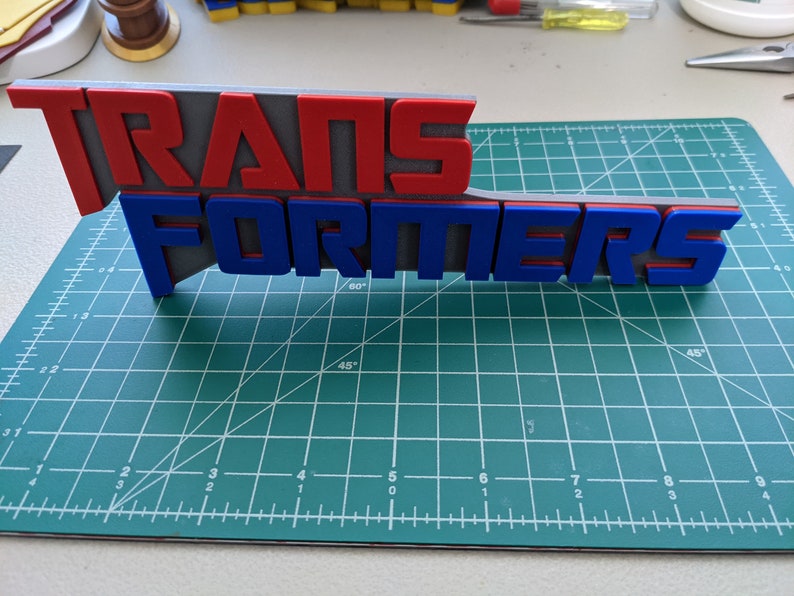 Transformers logo sign display shelf wall 3D printed color | Etsy