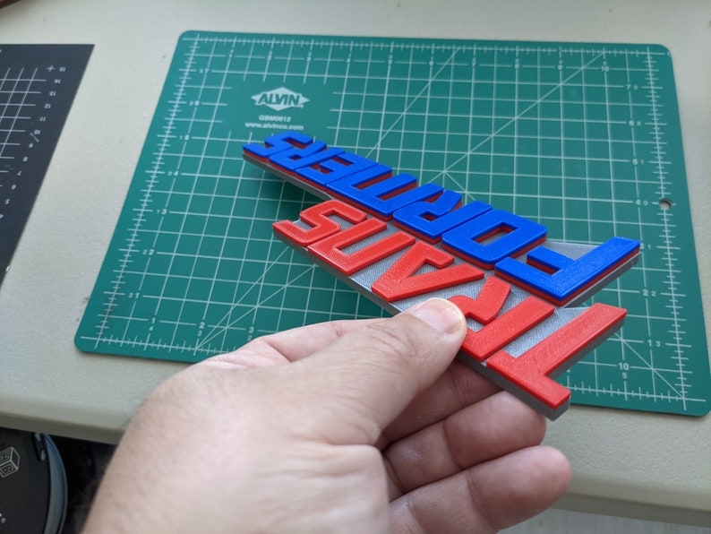 Transformers logo sign display shelf wall 3D printed color | Etsy