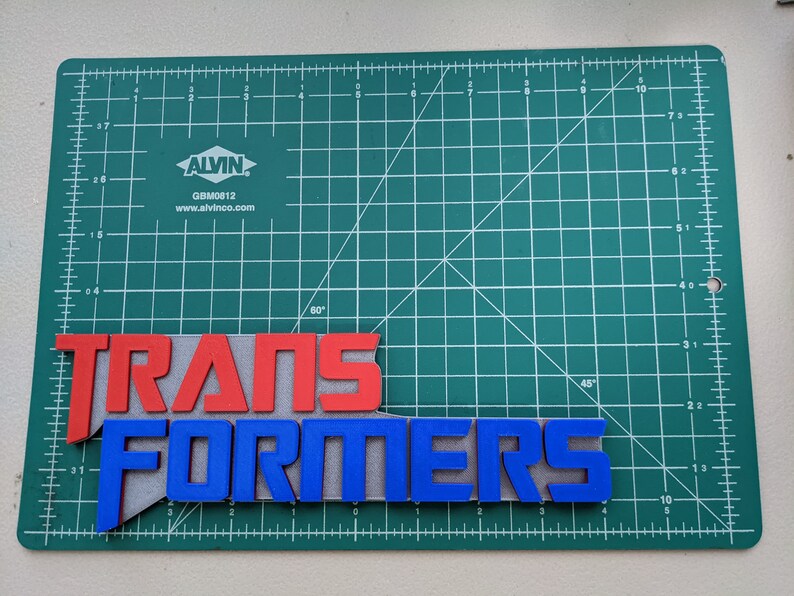 Transformers logo sign display shelf wall 3D printed color | Etsy