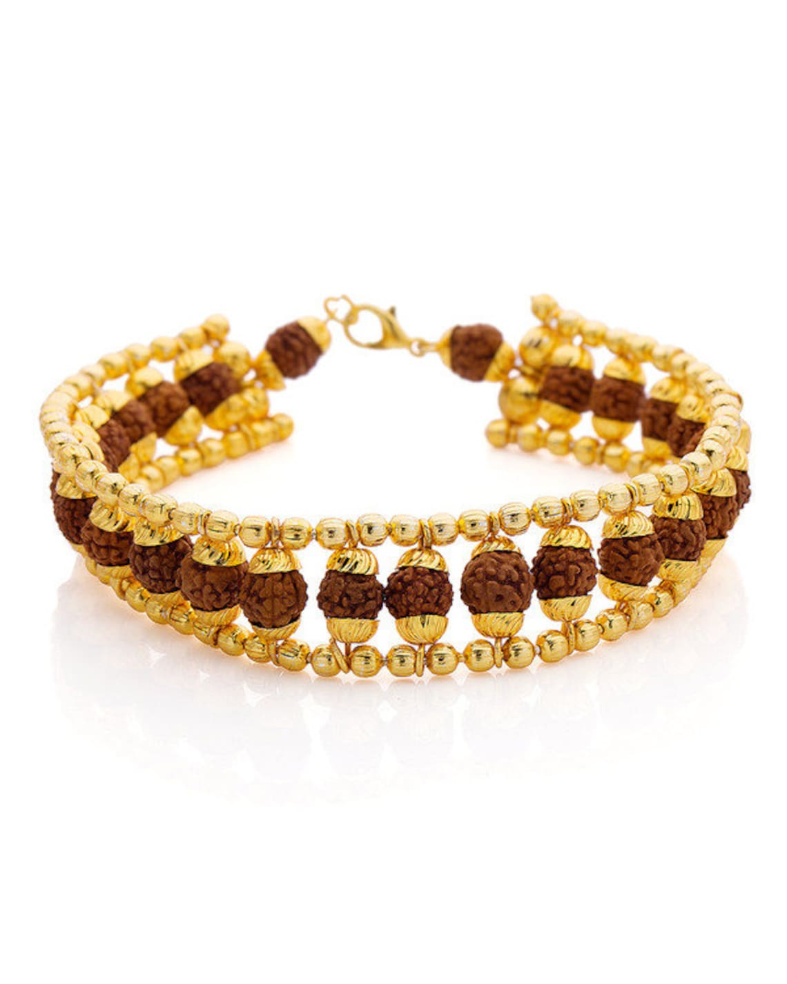 Rudraksha Bracelet With Golden Coloured Metal Caps Etsy rudraksha-bracelet-with-golden-coloured-metal-caps-etsy