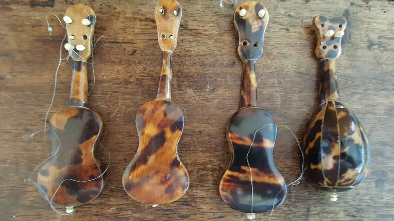 Vintage miniature faux tortoise shell mandolin, guitar and other string ...