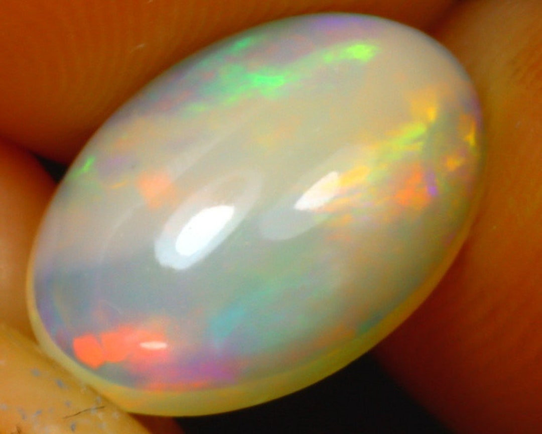 1.44ct Natural Ethiopian Play of Color Opal S1705 - Etsy