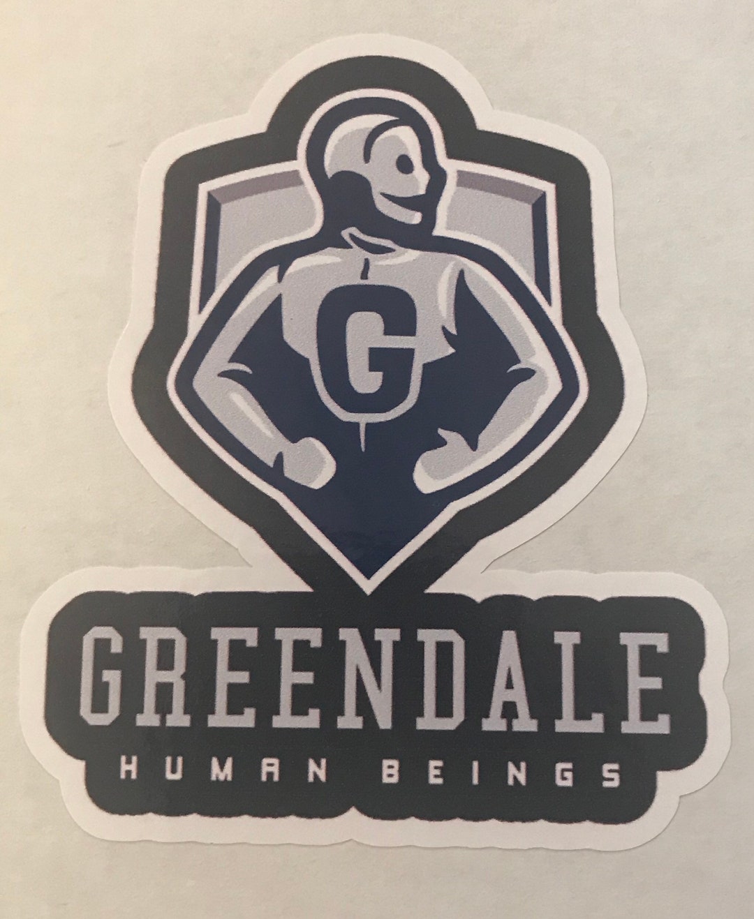 Greendale Human Beings Logo 4x3.5” Color Die Cut Vinyl Decal Water ...