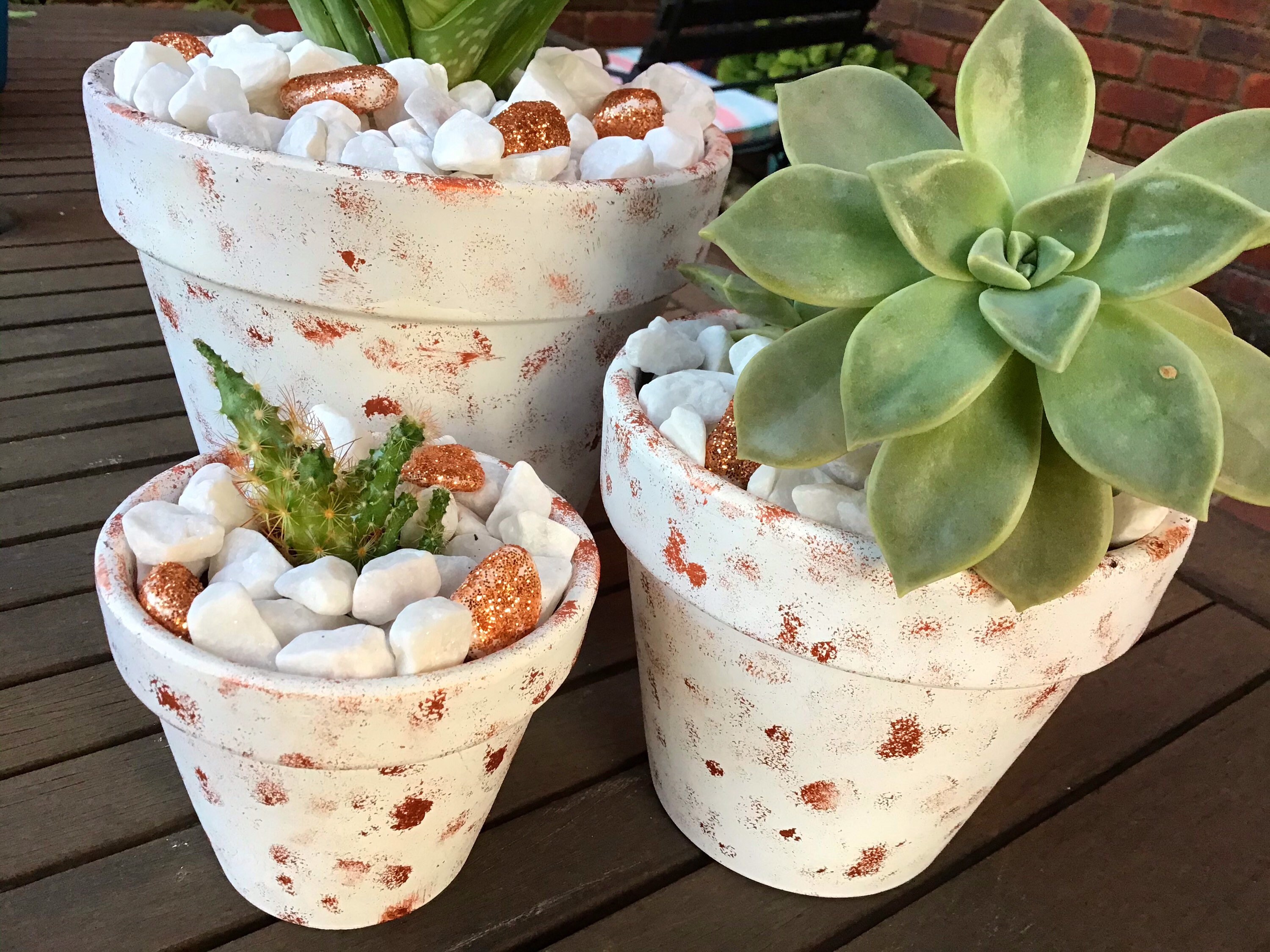 Rose gold and white metallic planter pots