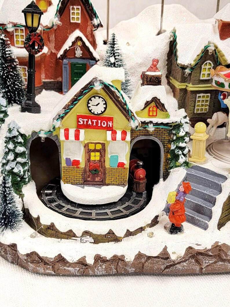 Christmas Village With Santa Sleigh & Reindeer. LED Light up Scene With ...