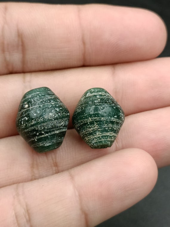 Ancient Pair Of PYU Spindle Whorl Green Glass Shell S… - Gem
