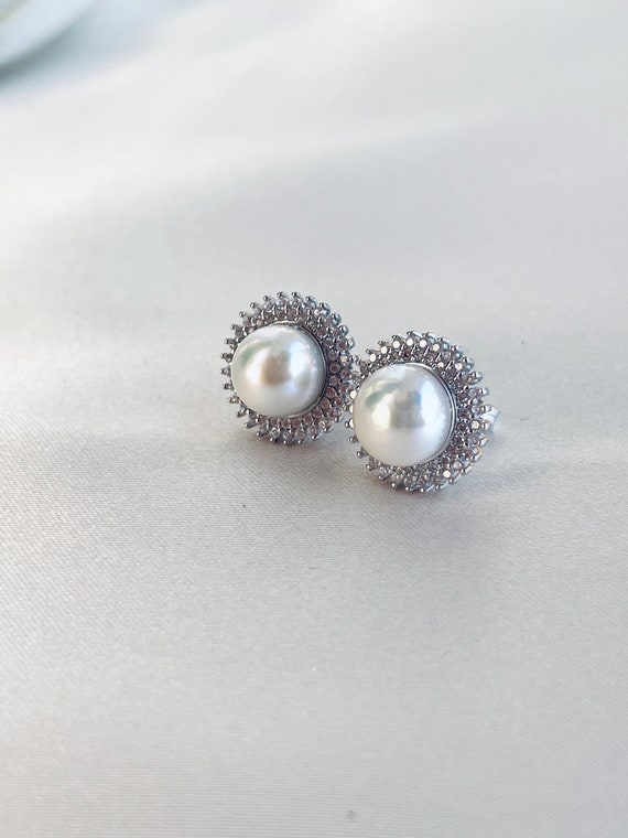 Swarovski pearl stud earrings store