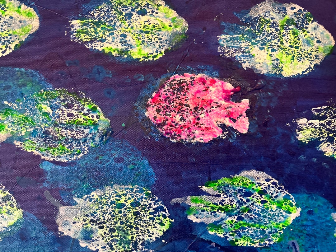 Pink Fish Swimming Against the Tide of Lime Green in a River of Blue ...