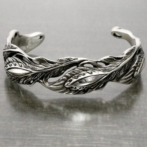 Garuda feather bangle | Etsy