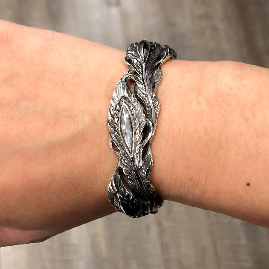 Garuda feather bangle | Etsy