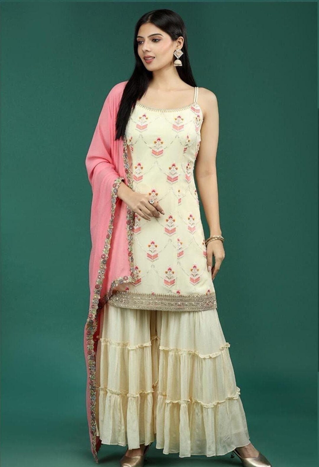 Cream Embroidered Salwar Suit Paired With a Pink Dupatta, Showcasing an ...