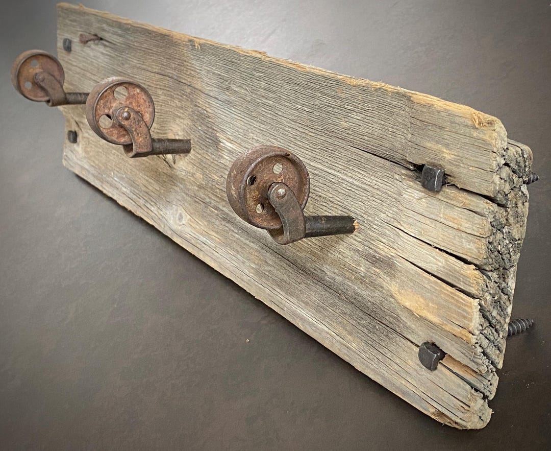 Reclaimed Barnwood Rack With 3 Antique Caster Wheel Hooks | Rustic ...