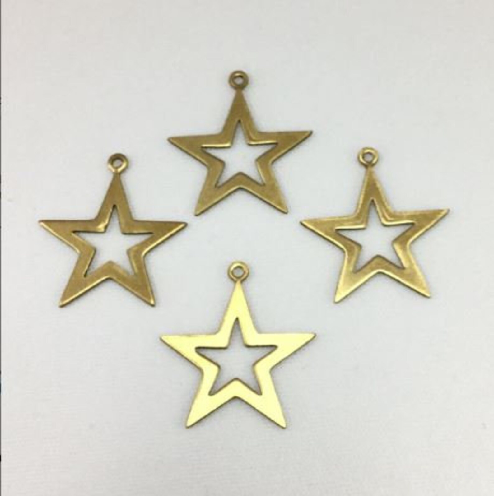Set of 4 5 point Raw Brass Stars Stampings With Hanging | Etsy