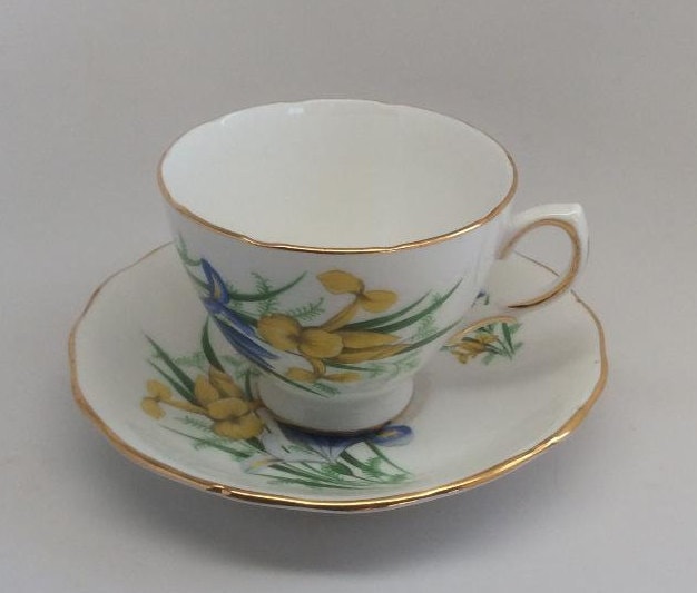 Crown Royal Tea Cup and Saucer. Design is a Yellow and Purple Iris ...