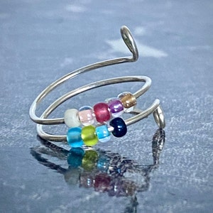 FIDGET RING - Fidget Toys for Kids and Women - 9 Multicolor Beads ...