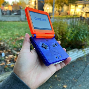 Vintage Gaming Redefined: Gameboy Advance SP Transparent Orange Purple ...