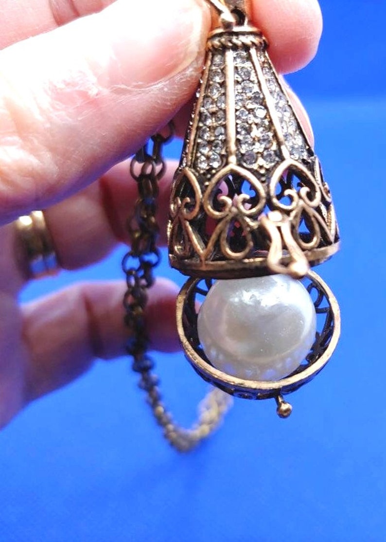 Steampunk Cage Locket With Clear Crystals Necklace on a 21 - Etsy