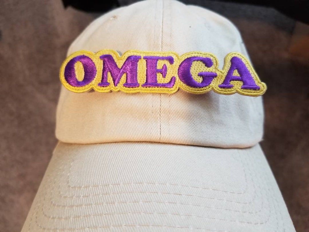 Omega Baseball Cap; 1911, Omega Man, Que, Roo, Purple and Old Gold, Owt ...