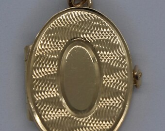 14K Gold Small Round Locket With Floral Center and Ribbon | Etsy