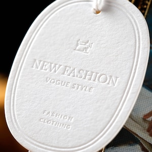 Custom White Clothing Hang Tags Swing Tag Thick Paper Hangtag Oval Hang ...