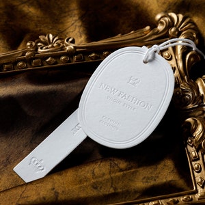 Custom White Clothing Hang Tags Swing Tag Thick Paper Hangtag Oval Hang ...