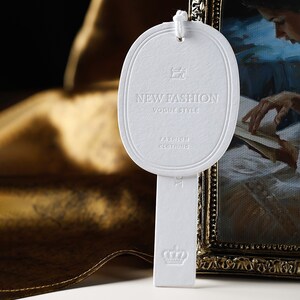 Custom White Clothing Hang Tags Swing Tag Thick Paper Hangtag Oval Hang ...