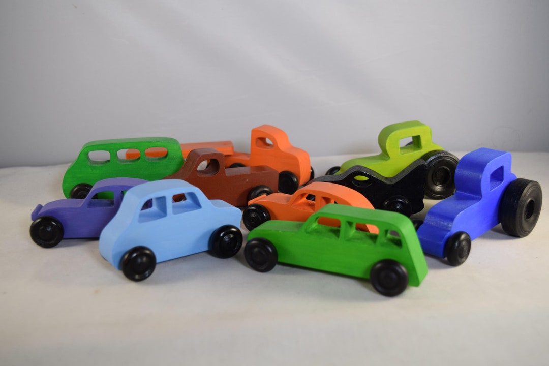 Several Small Brightly Colored Wooden Cars, Bright Colors, Traditional ...
