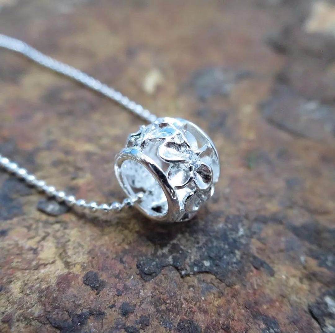 Hawaiian Jewelry 925 Sterling Silver Plumeria Clear CZ Barrel Pendant ...