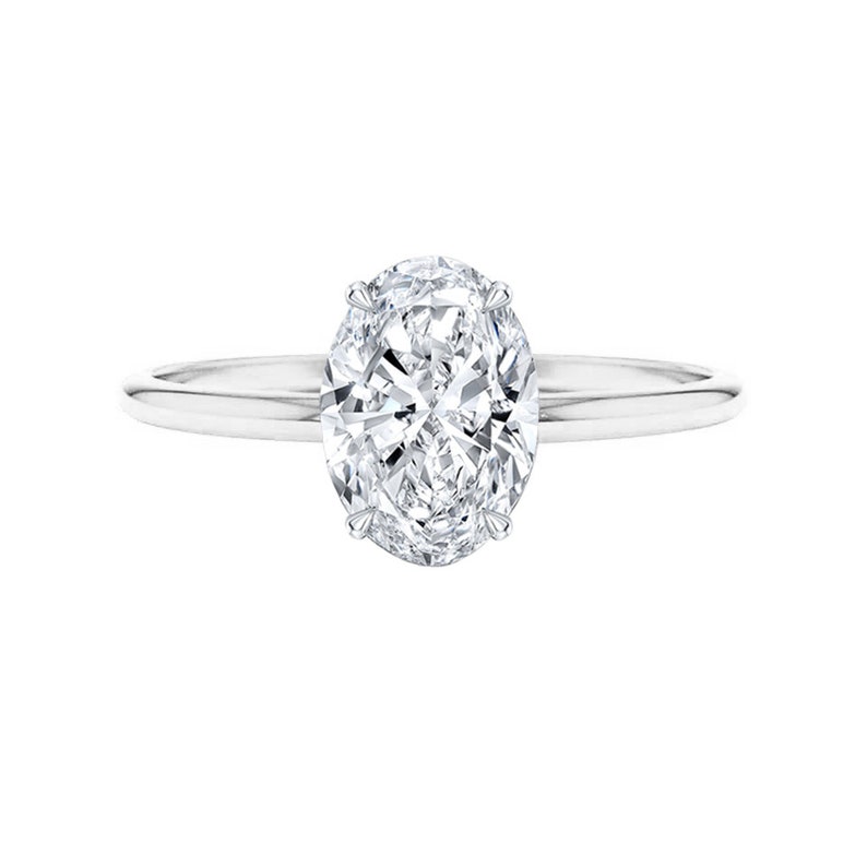 Lab Created 1 Carat Solitaire Oval Diamond Engagement Ring in 18K Gold ...