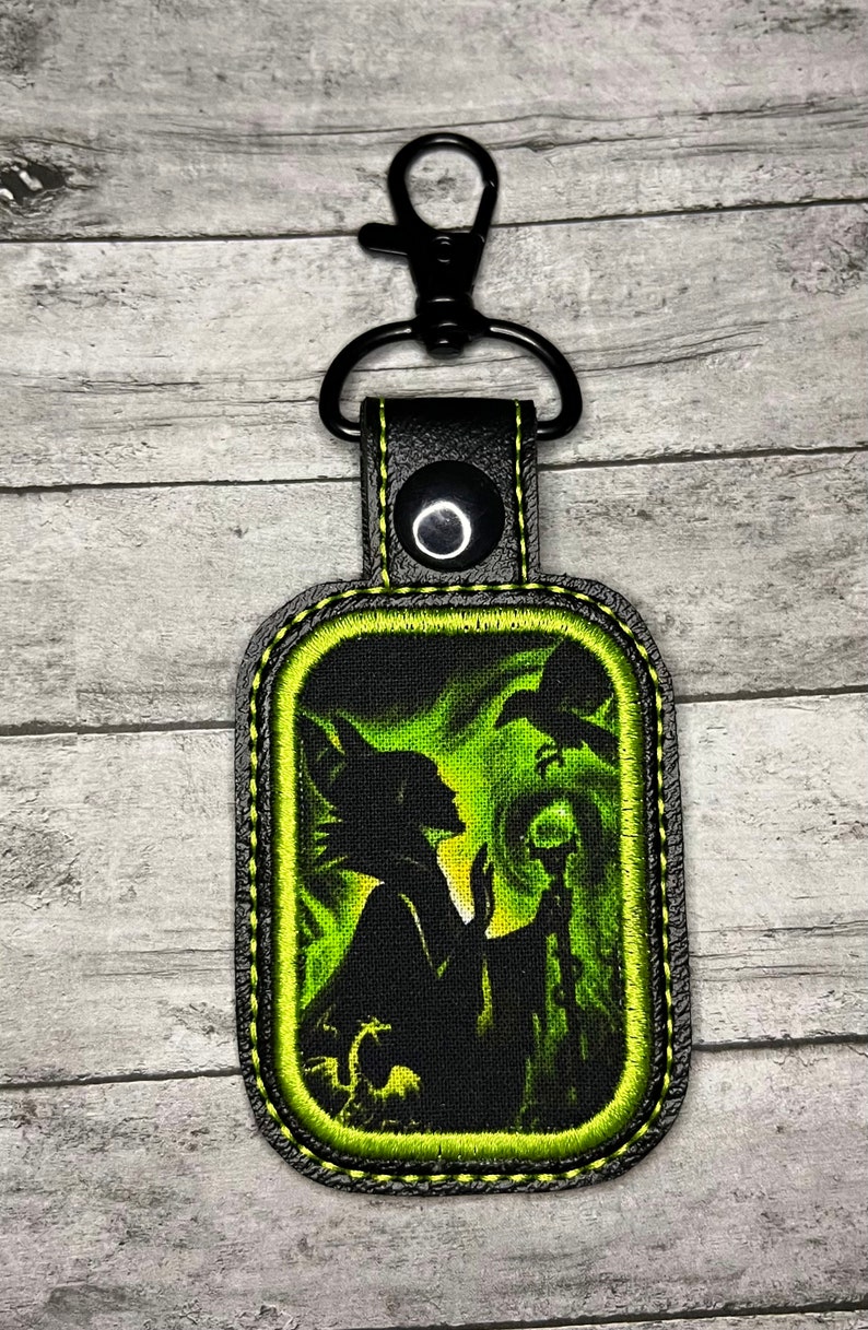 Disney Villains Aldi Quarter Holder Maleficent, Ursula Snap Tab ...