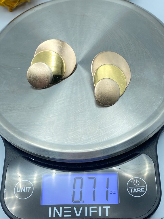 Vintage Monet Graduated Disk Clip On Earrings In Gold… - Gem