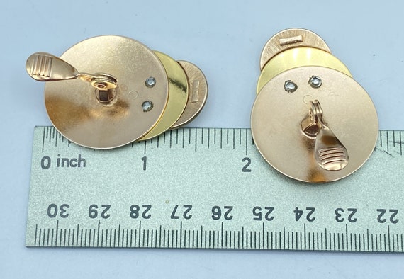 Vintage Monet Graduated Disk Clip On Earrings In Gold… - Gem