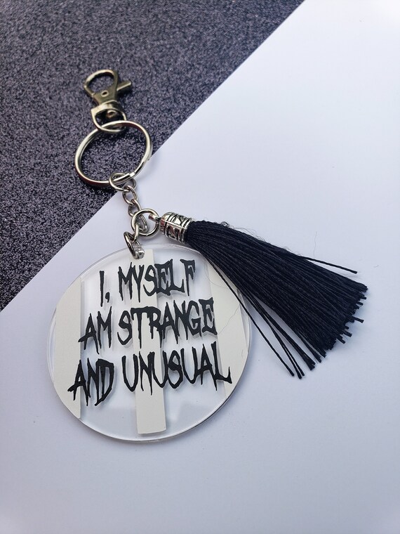 Strange & Unusual Keychain | Etsy