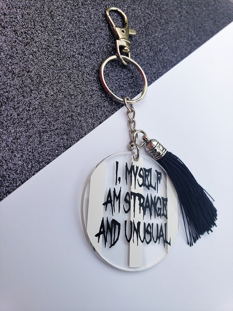 Strange & Unusual Keychain | Etsy