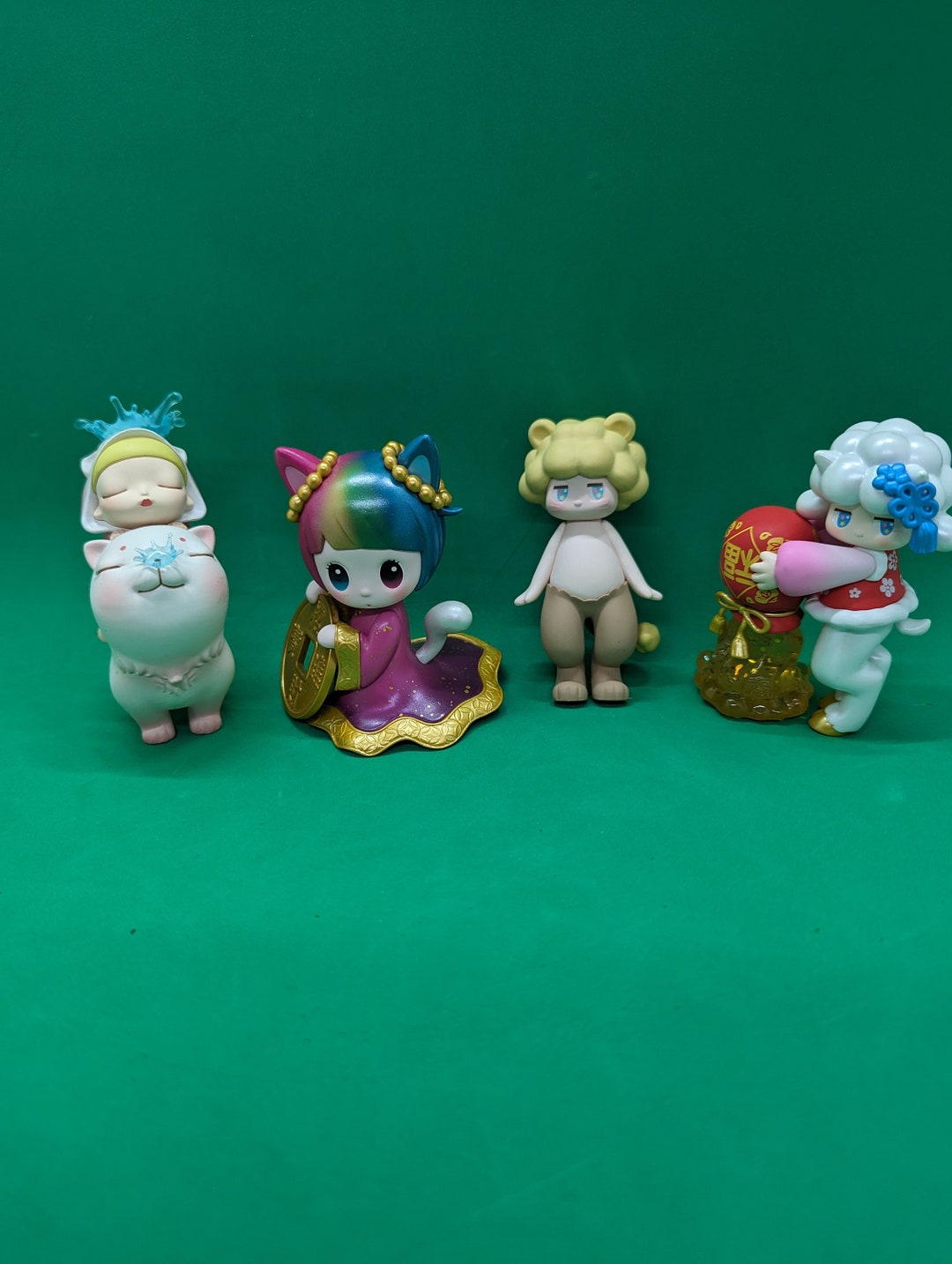 Pop Mart Characters. There Are Four Characters. Marked Pop Mart With ...