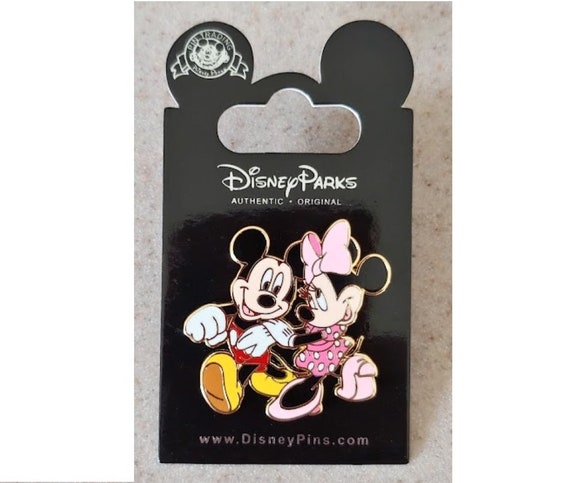 Old Mickey Mouse And Minnie Mouse Holding Hands
