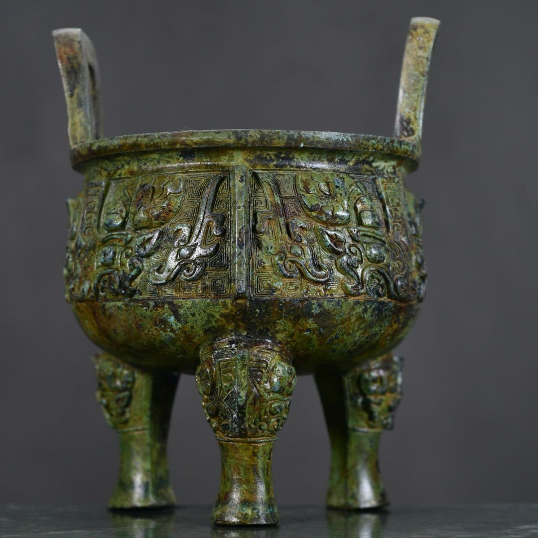 A Rare and Exquisite Bronze Tripod Statue With Animal-face Patterns ...