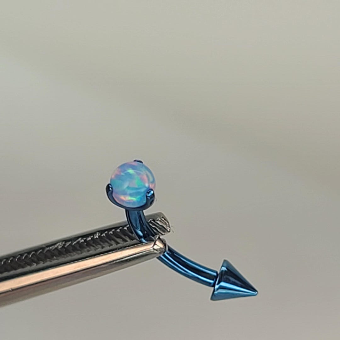16g Titanium Spike + Cornflower Blue Opal Curved Barbell Eyebrow Rook ...