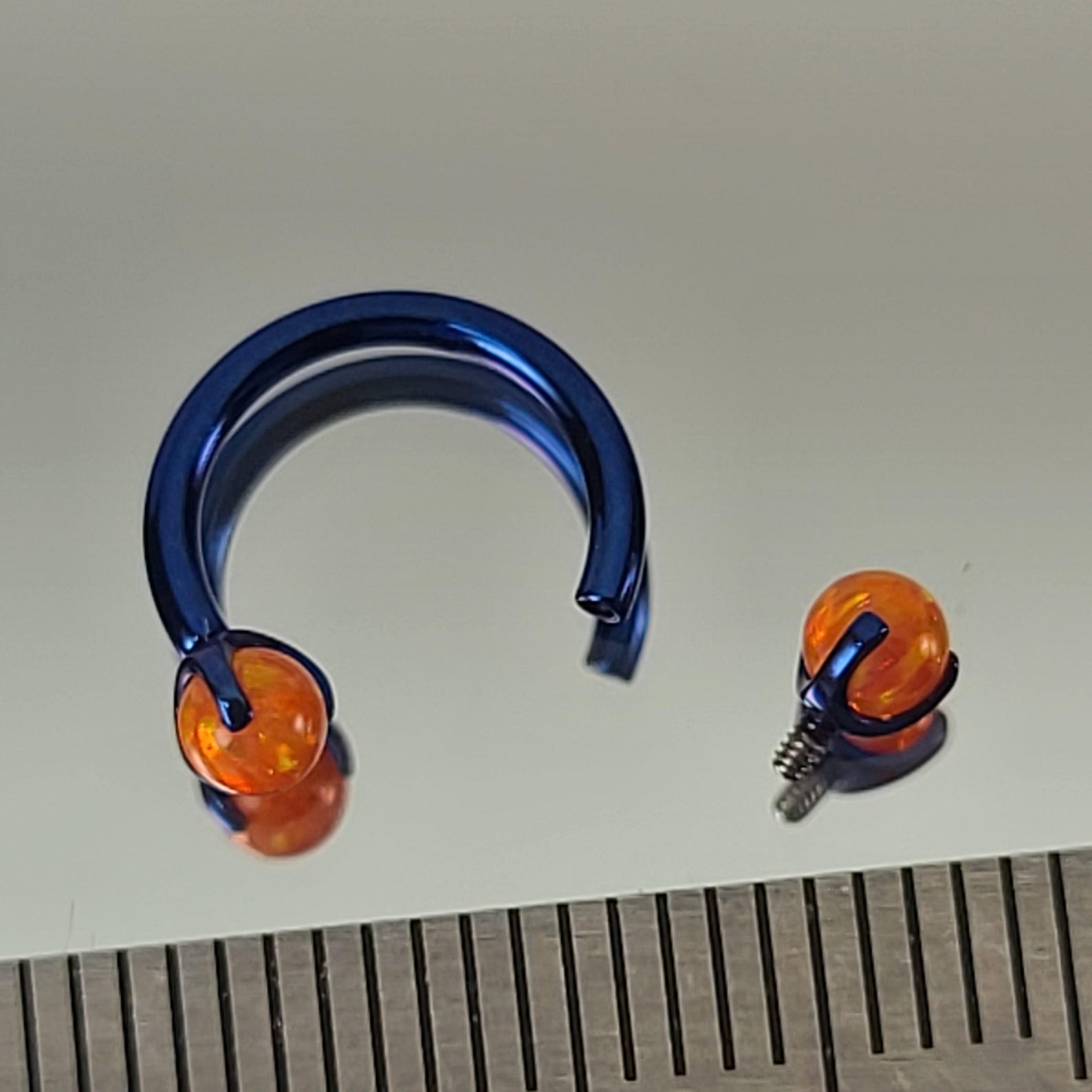 16g Titanium Horseshoe Internally Thread W/3mm Orange Claw Opal Ends ...