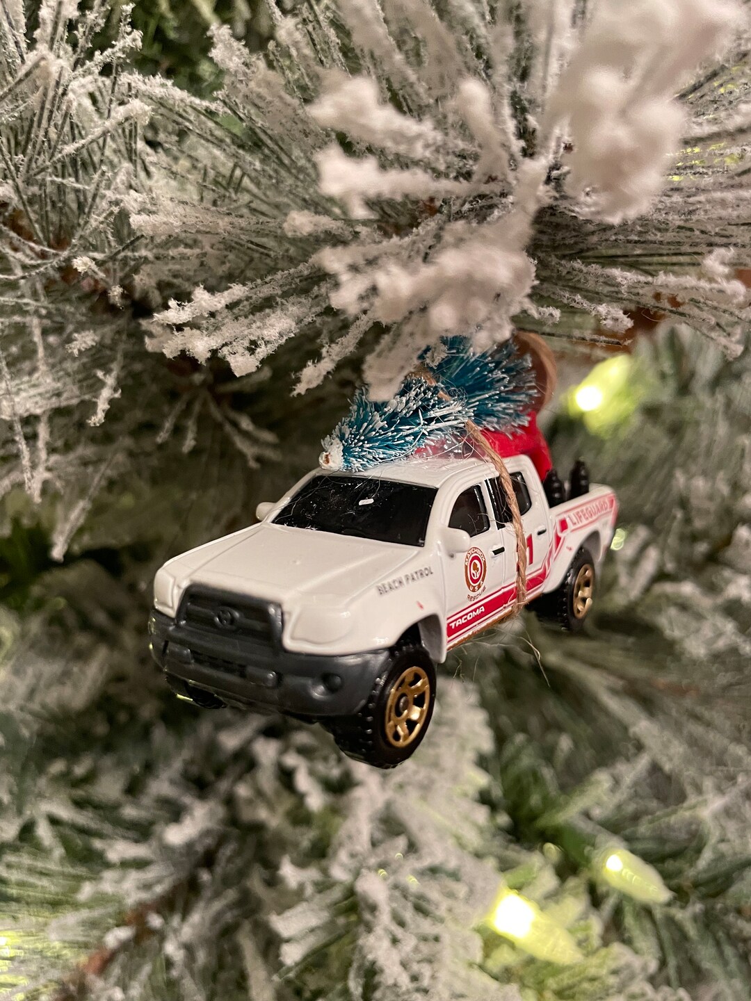 Toyota Tacoma White Lifegaurd Carrying Christmas Tree Christmas ...