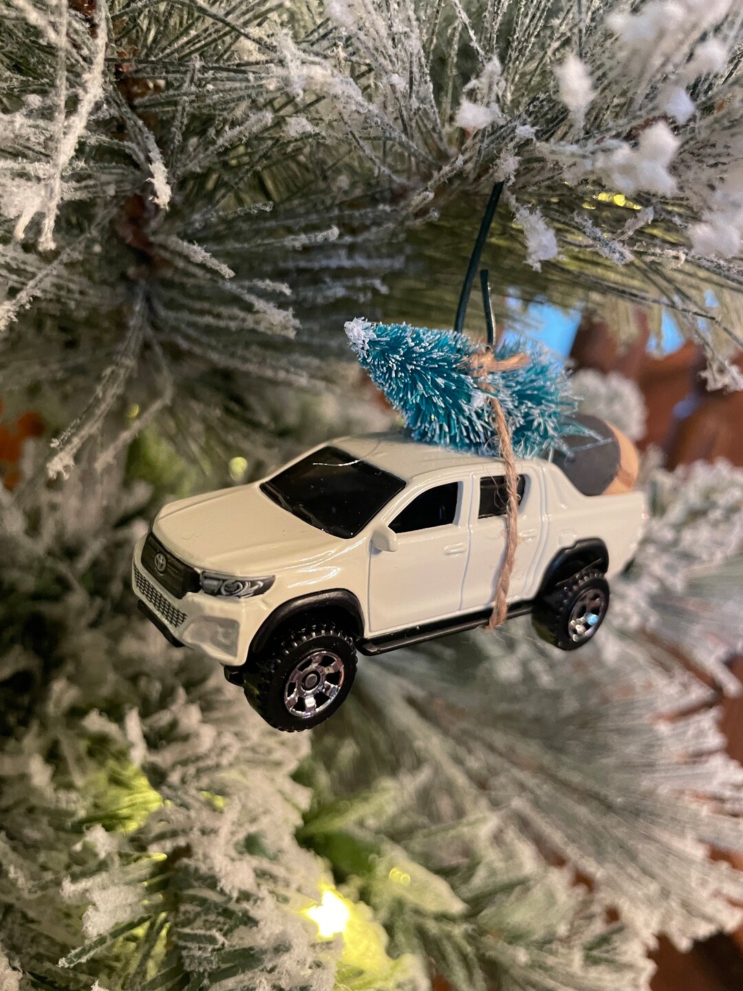 Toyota Hilux White Carrying Christmas Tree Christmas Ornament Hot Wheel ...