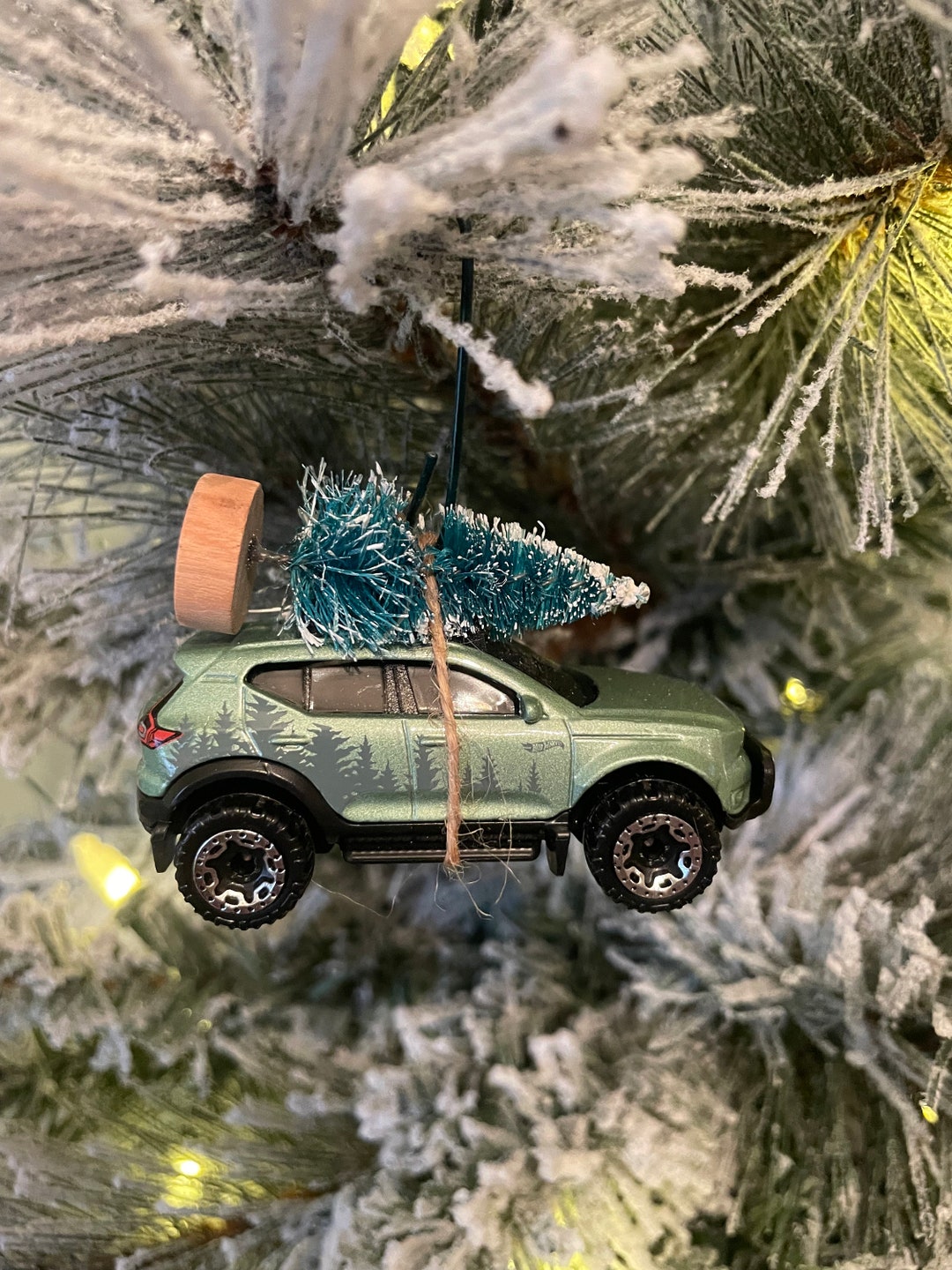 Volvo XC40 Recharge Green Carrying Christmas Tree Christmas Ornament ...