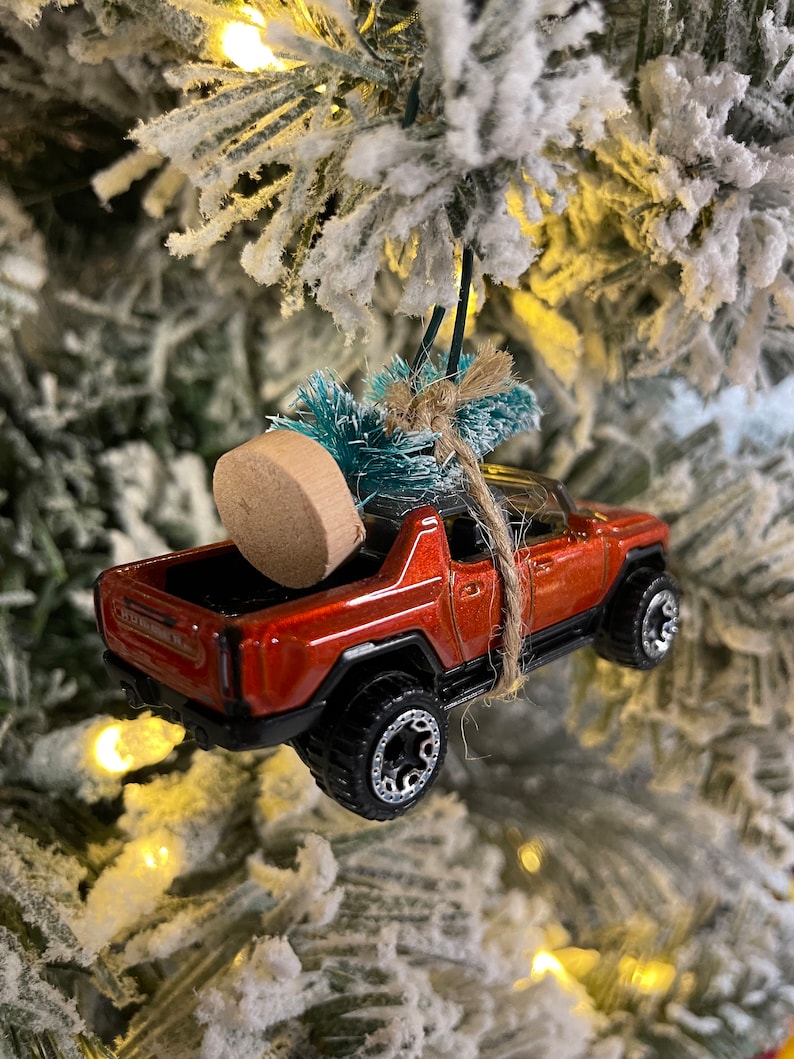 Hummer EV Orange Carrying Christmas Tree Christmas Ornament Hot Wheel ...