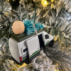 Mercedes Benz Sprinter Camper Van Carrying Christmas Tree Christmas ...